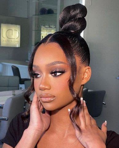 Best Bun With Bangs Hairstyles For Black Women Sleek Ponytail