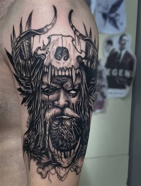 A Man S Half Sleeve With A Skull And Wings On It