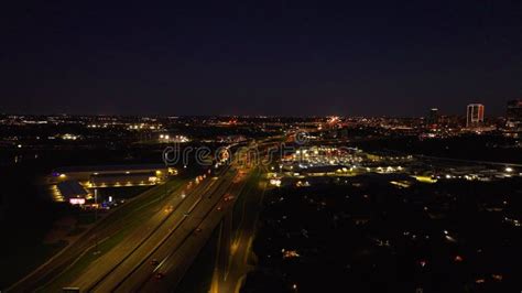 Fort Worth Cityscape At Night With Glowing Highways With Traffic