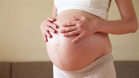 Caring Mother Strokes Naked Pregnant Tummy Two Hands Light Room Stock
