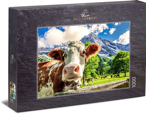 Ulmer Puzzleschmiede Puzzle Vacas y montañas Puzzle de 1000 Piezas