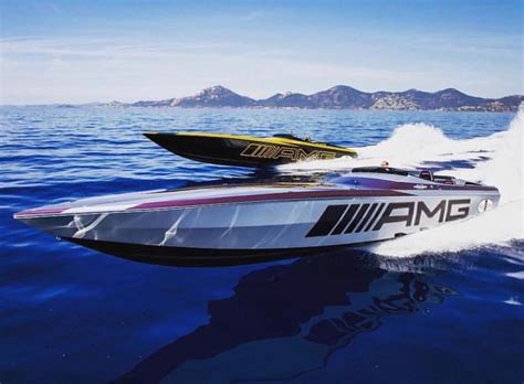 Two Speed Boats In The Water Near Each Other