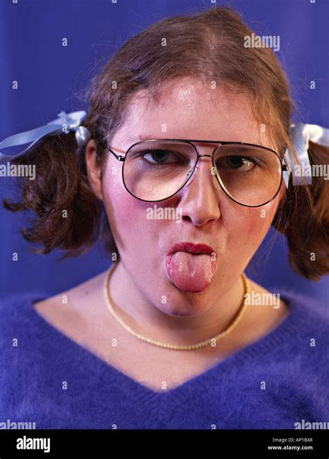 Chubby Girl Is Showing Her Tongue Stock Photo Alamy
