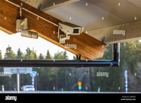 Technological View Of Security Surveillance Camera Under Roof Of House