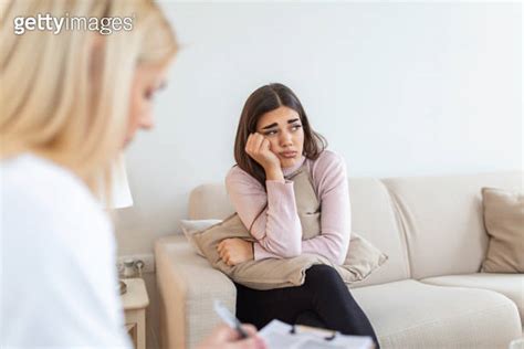 Psychologist Listening To Her Patient And Writing Notes Mental Health