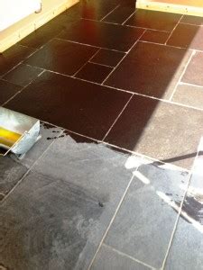 Resolving Installation Issues With A Black Limestone Tiled Floor