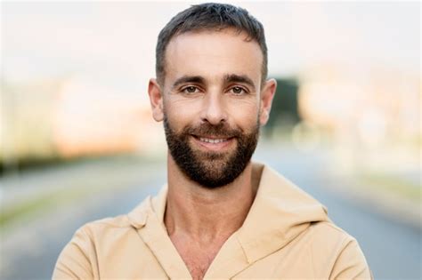 Premium Photo Portrait Of Handsome Smiling Latin Man Wearing Casual