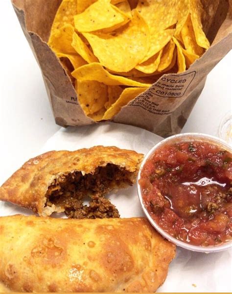 TWO EMPANADAS CHIPS SALSA The Naked Empanada