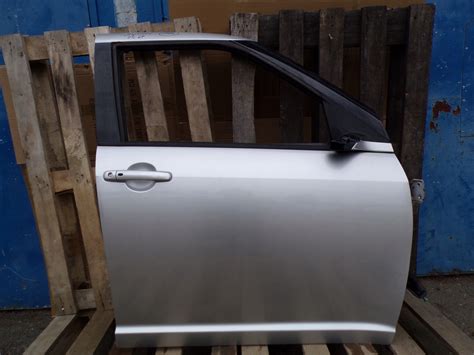 Suzuki Swift III MK6 DRZWI PRAWE PRZEDNIE ZCC Nr 104 SREBRNE 2006