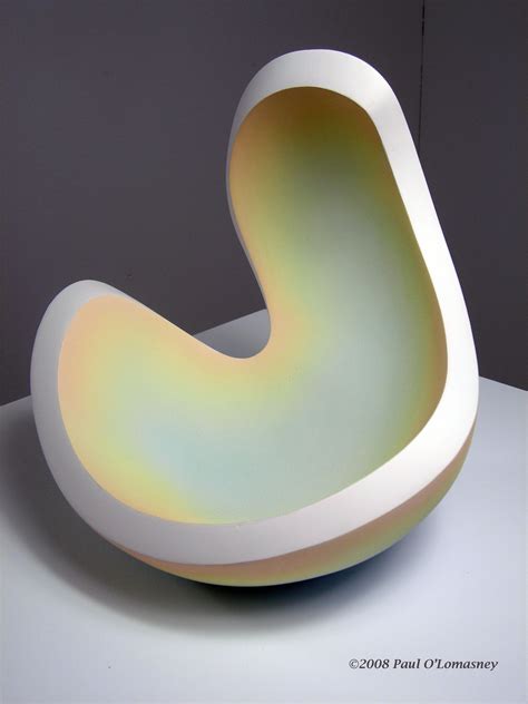 A White Sculpture Sitting On Top Of A Table