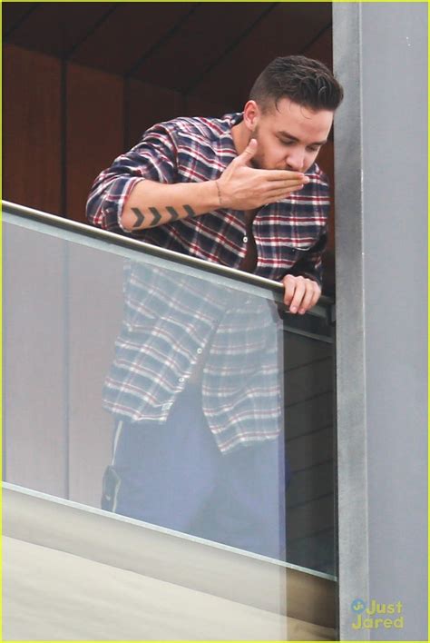 Shirtless Liam Payne Blows Kisses To Fans From Hotel Balcony Photo