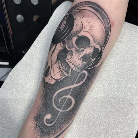 56 Melodiously Meaningful Music Note Tattoo Ideas For 2024