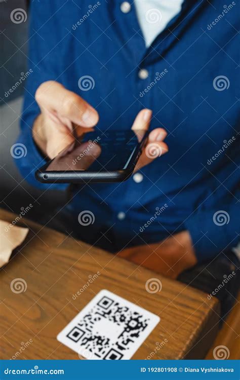 Man Scanning The Qr Code With Mobile Phone Stock Photo Image Of