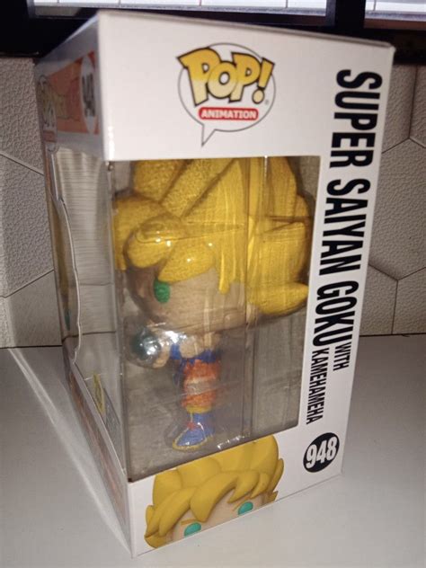 Funko Pop Dragonball Z Super Saiyan Goku With Kamehameha Glows In The