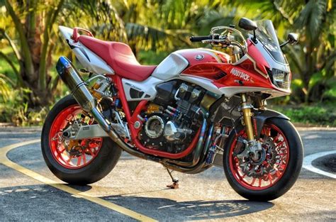 Red And White Honda CB Super Four Motorcycle