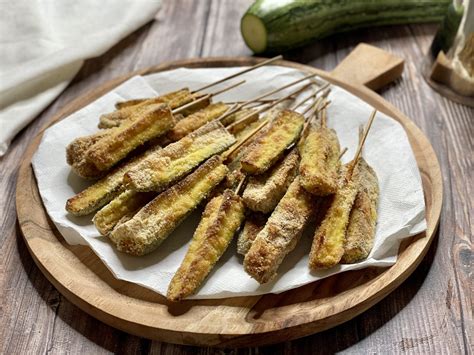 Bastoncini Di Zucchine Impanate Al Forno Una Famiglia In Cucina