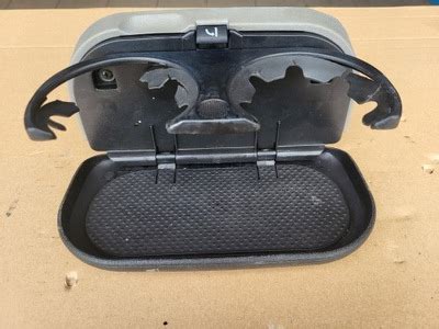UCHWYT NA KUBKI KUBEK VW T4 Multivan Caravelle 8706337003 Oficjalne