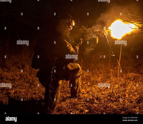An East Coast Based U S Naval Special Warfare Operator SEAL Fires At