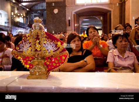 Religious Devotees Inside The Church Of Santo Nino In Cebu City Stock
