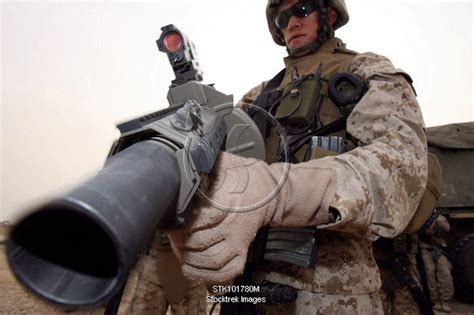 A Marine Holds The M 32 Multiple Shot Grenade Launcher Stocktrek Images