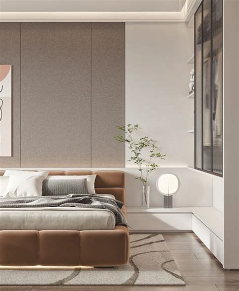 A Large Bed Sitting In The Middle Of A Bedroom Next To A Painting On