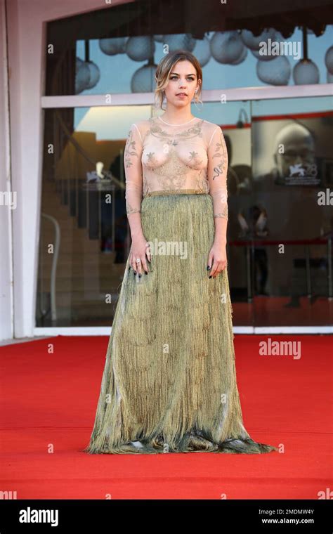 EDS NOTE NUDITY Salome Dewaels Poses For Photographers Upon Arrival