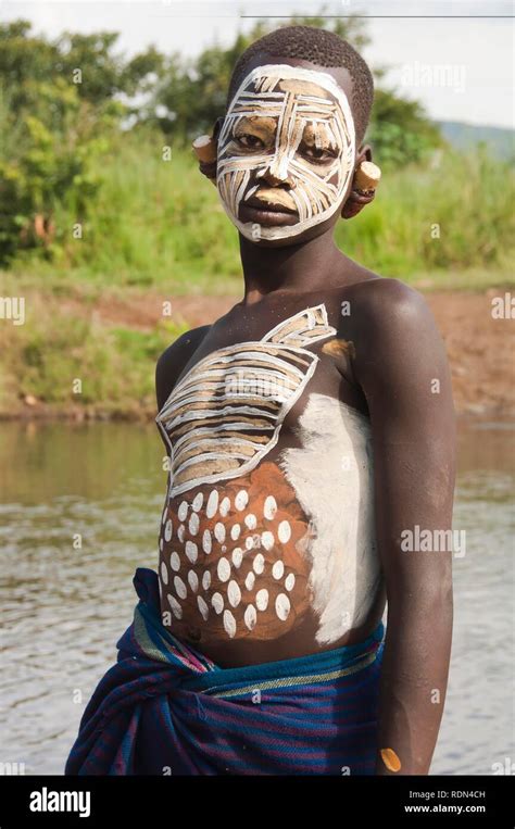 Surma Girl With Facial And Body Painting And Earlobe Plates Kibish