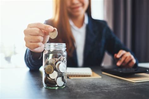 Premium Photo Closeup Image Of A Businesswoman Collecting And Putting