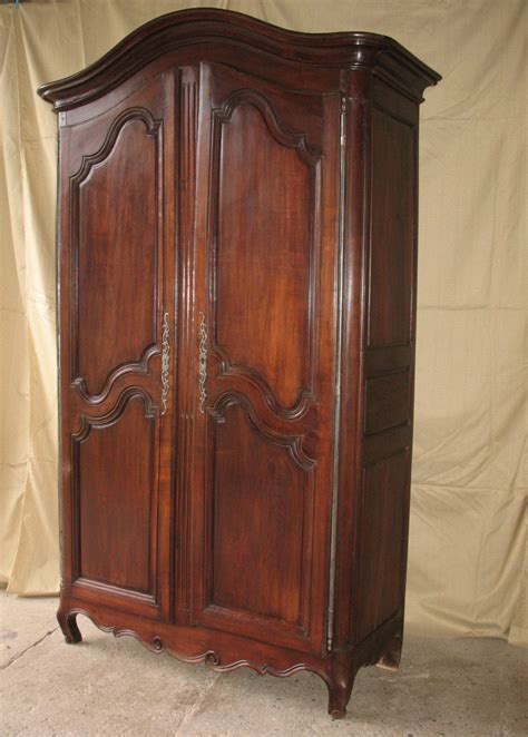 Proantic Armoire en bois fruitier début 19ème de style Louis XV
