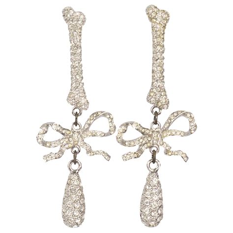 Vivienne Westwood Boucles d oreilles Faustine en argent avec nœud