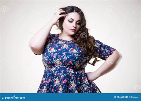 Plus Size Fashion Model In Casual Clothes Fat Woman On Beige Background Overweight Female Body