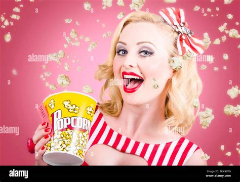 Retro Photograph Of A Beautiful Vintage Girl With Surprise Expression Watching Premier Film At
