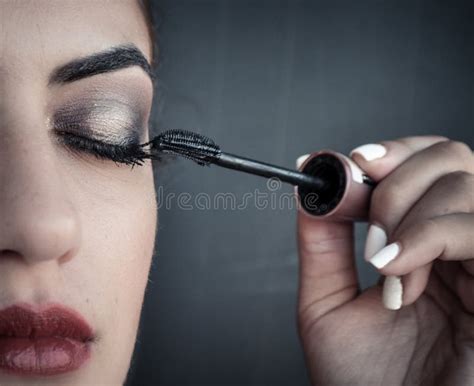 Woman Applying Mascara On Her Eyes Stock Image Image Of Blue Healthy
