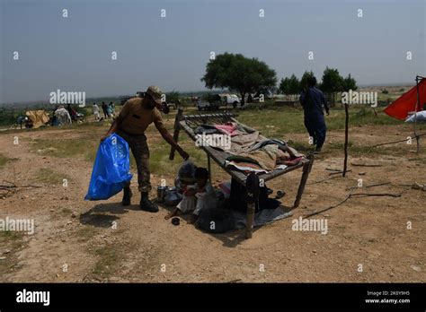 Pakistani Army Distribute Relief Goods To People Affected By Floods In