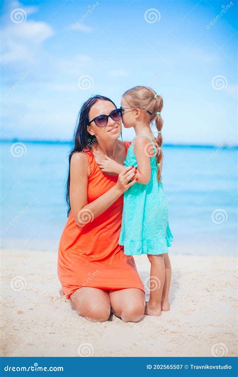 Beautiful Mother And Daughter At The Beach Enjoying Summer Vacation Stock Image Image Of Ocean