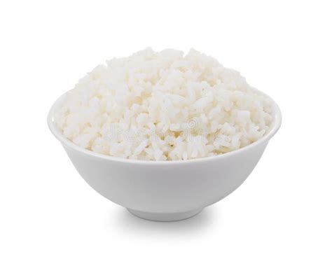 Cuenco Por Completo De Arroz En El Fondo Blanco Imagen De Archivo