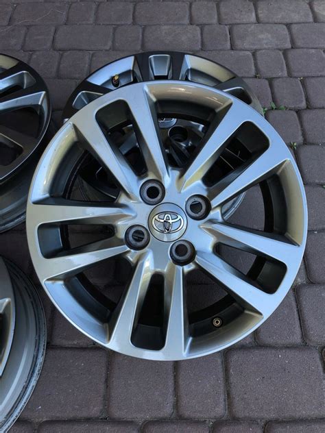 Felgi Toyota 4x100 15 Cali CZUJNIKI YARIS 12660186474 Oficjalne