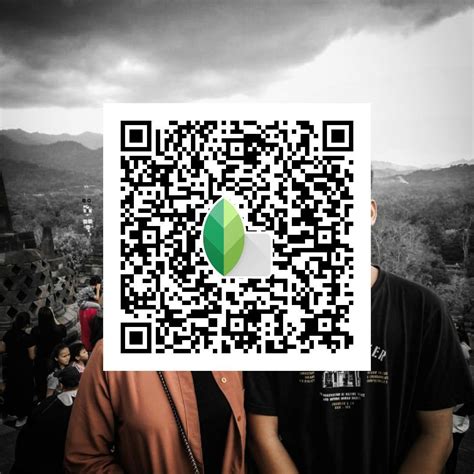 Two People Standing Next To Each Other With A Qr Code On Their Face In