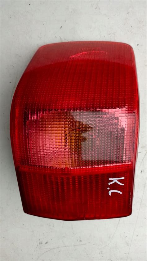 LAMPA TYŁ LEWA W BŁOTNIKU AUDI 80 B4 KOMBI 13385345308 oficjalne