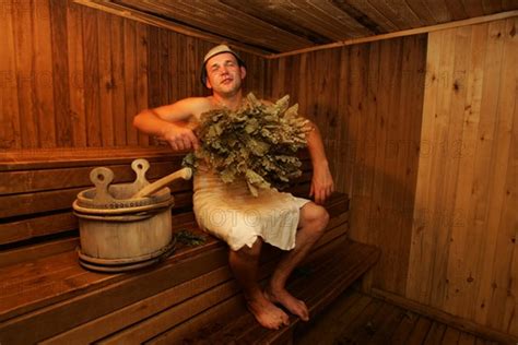 A Man Rubbing Himself With A Birch Branch At A Banya Sauna At The Pushkarskaya Photo12
