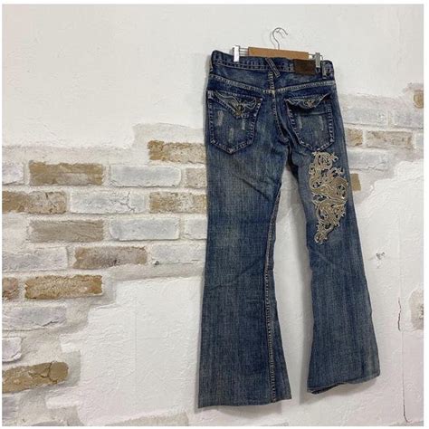 Tornado Mart Flared Jeans With Tribal Print Depop Depop