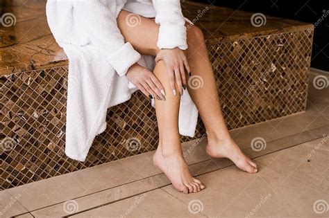 Deep Vein Thrombosis And Varicose Of Woman Girl Touching Her Legs And Looking At Veins Stock