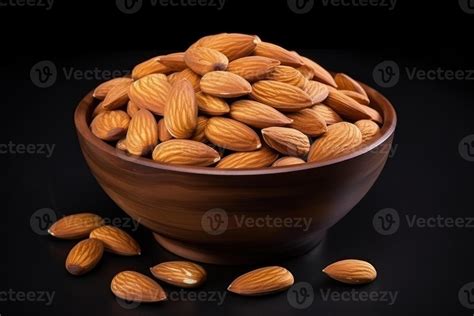 AI Generated A Bowl Of Almond Nuts In A Bowl On A Black Background