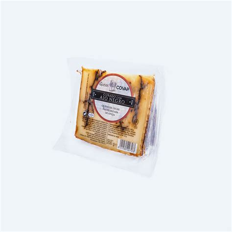 Queso De Oveja Pasteurizado Curado Con Ajo Negro Cu A Mesa Y Yantar