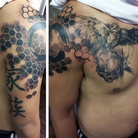 Eagle Holding Skull And Honeycomb Tattoo Mens Chest Tattoo Designs Men