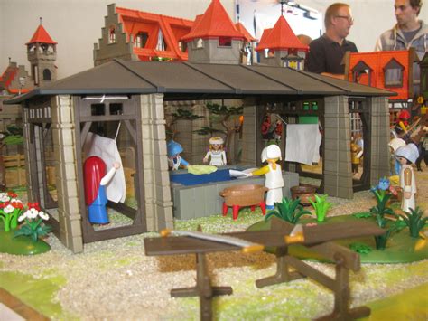 Diorama Playmobil scène village moyen age médiéval chateau fort lavoir