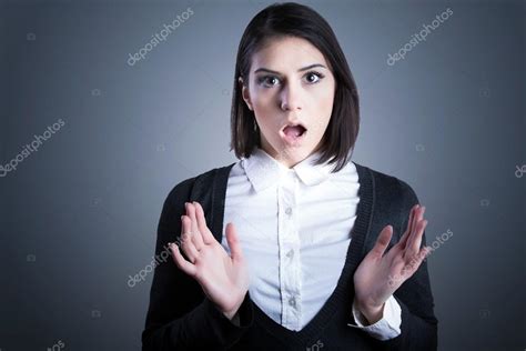 Excited Woman Looking Surprised And Amazed Speechless With Mouth Open