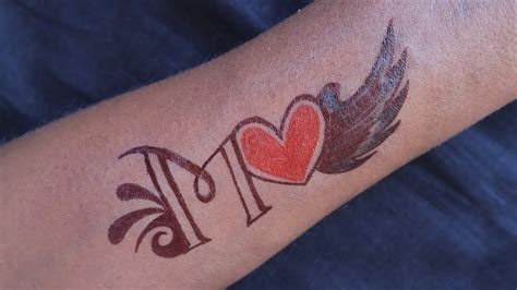 Very Simple M Letter Tattoo Design With Pen Simple And Temporary