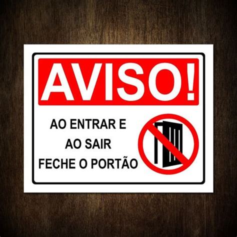 A Red And White Sign That Says Avaso Ao Entra E Ao Saor Feche O Potao