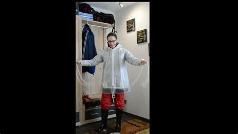Solo Woman Lady Nadja Layers Herself In Rainwear During Self Bondage